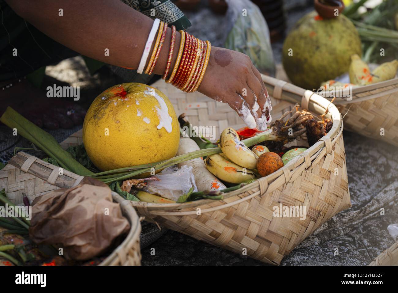 Hindu devotees perform rituals as they offer prayers to the Sun god in ...