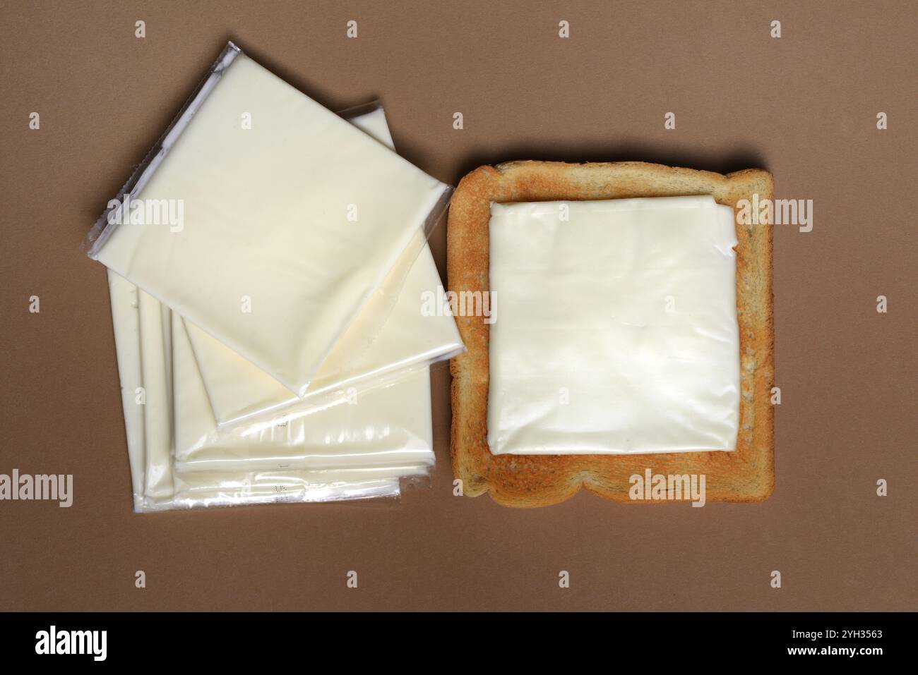 Cheese slices with toast, processed cheese in packaging Stock Photo - Alamy