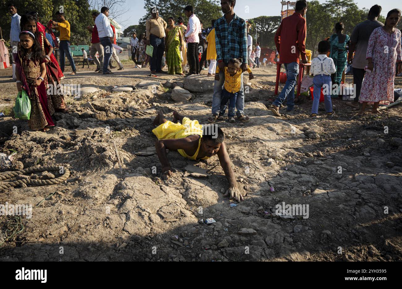 Hindu devotees perform rituals as they offer prayers to the Sun god in ...