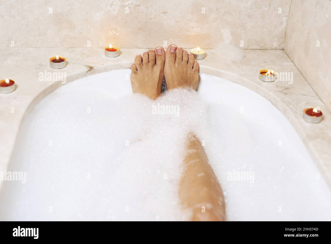 Woman in bath legs hi-res stock photography and images - Alamy