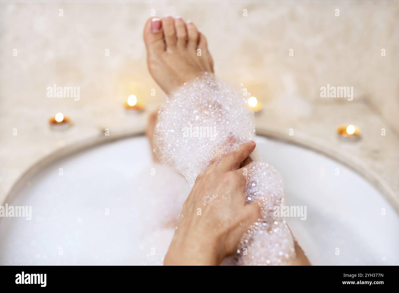 Woman in bath legs hi-res stock photography and images - Alamy