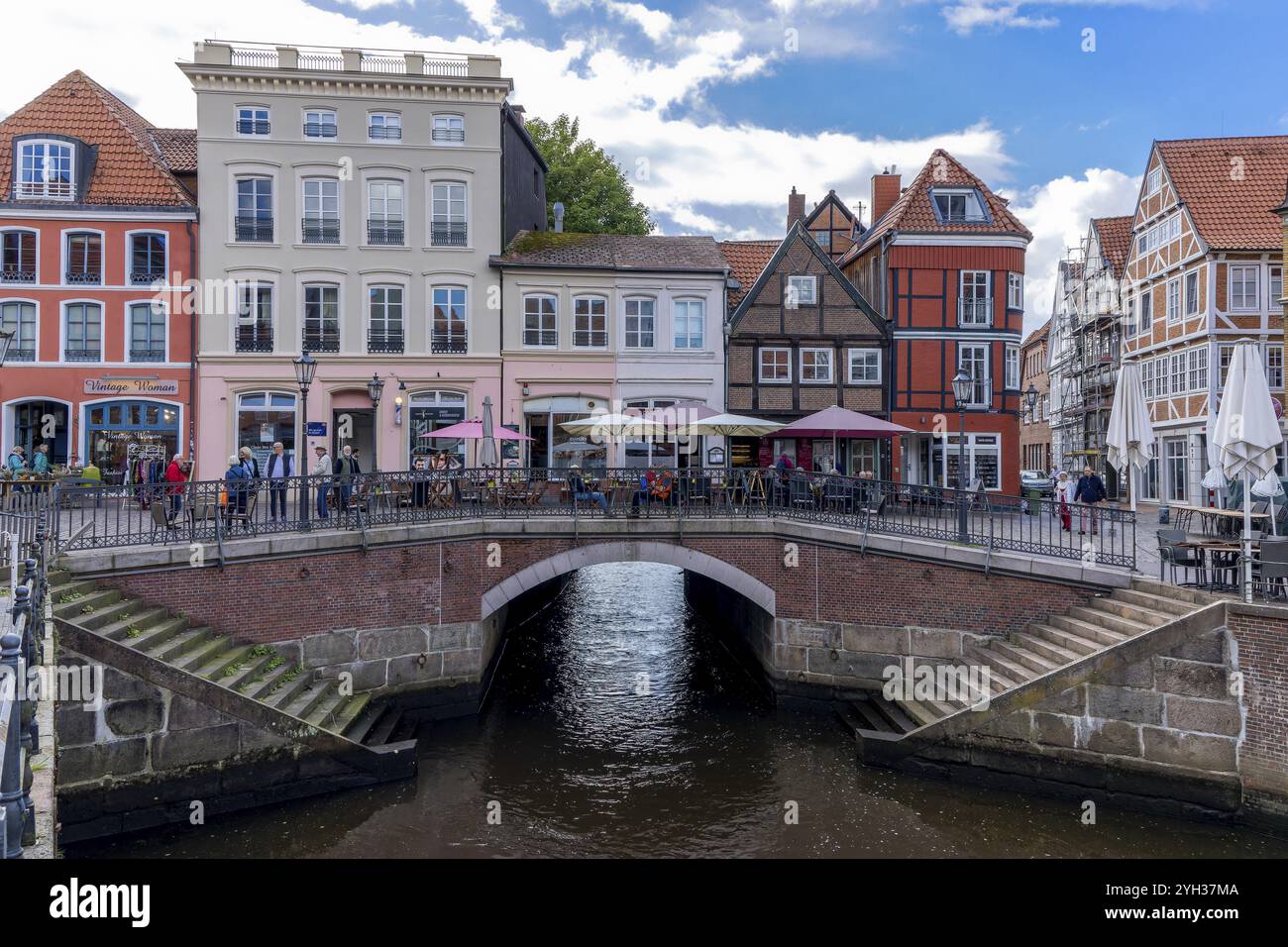 Brick-walled barrel-vaulted bridge Hudebruecke and stairs to the river ...