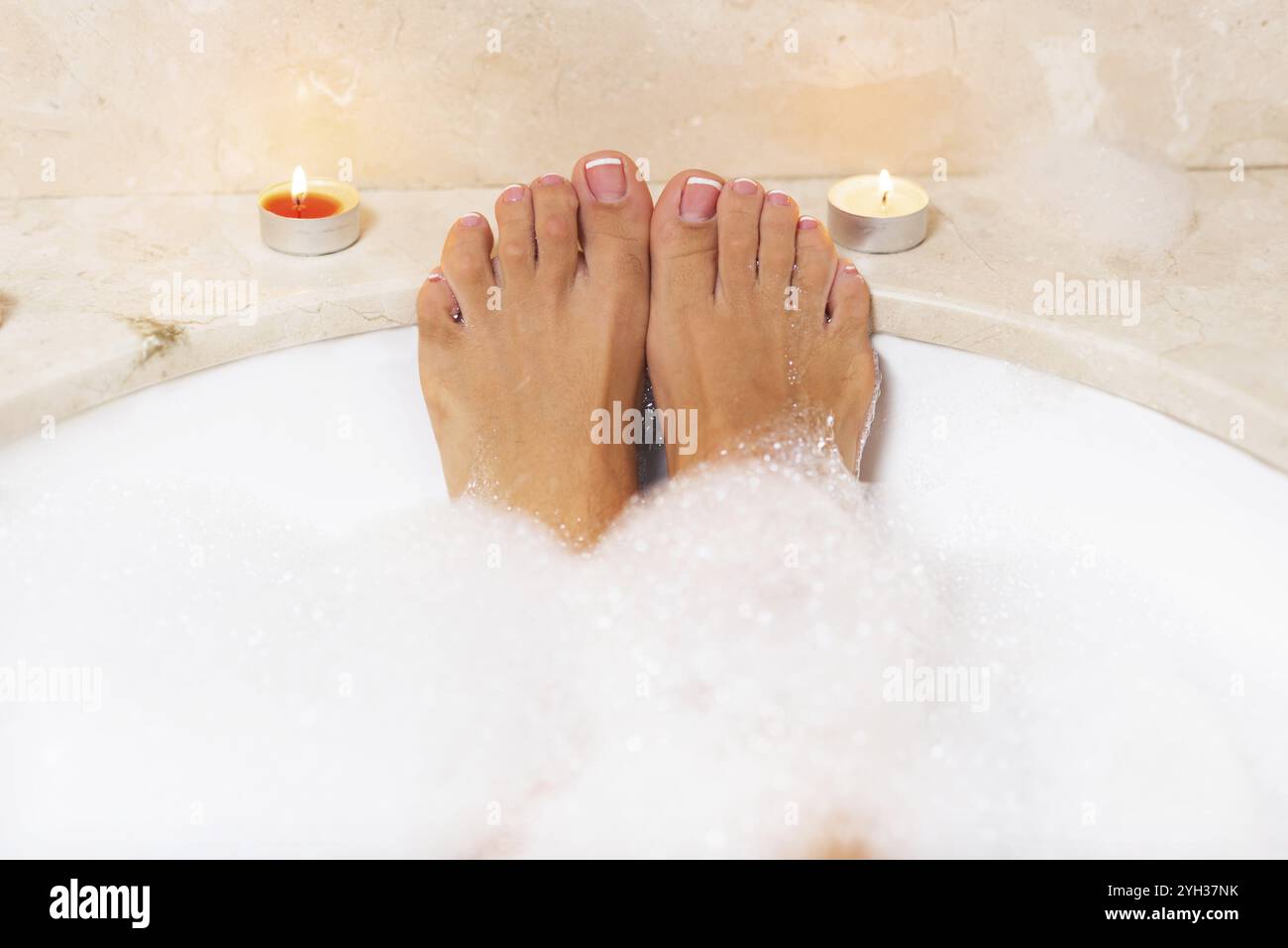 Woman in bath legs hi-res stock photography and images - Alamy