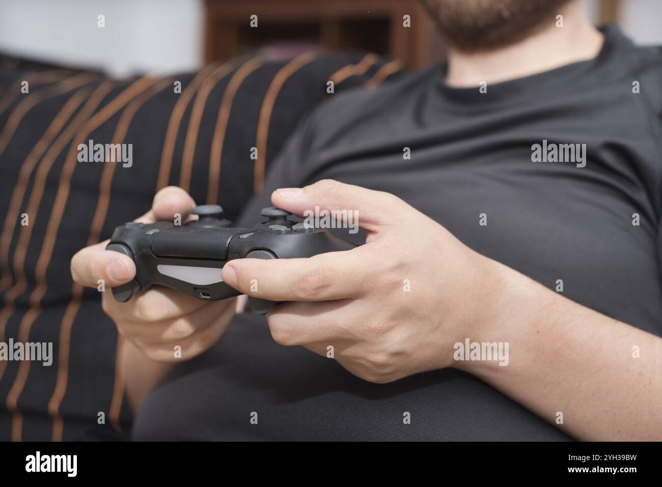 Consoles playing hi-res stock photography and images - Alamy