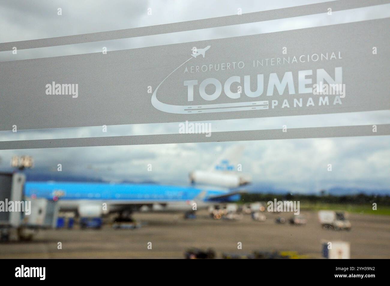Panama City, Panama, June 04, 2021: Tocumen International Airport signage with a plane preparing ...