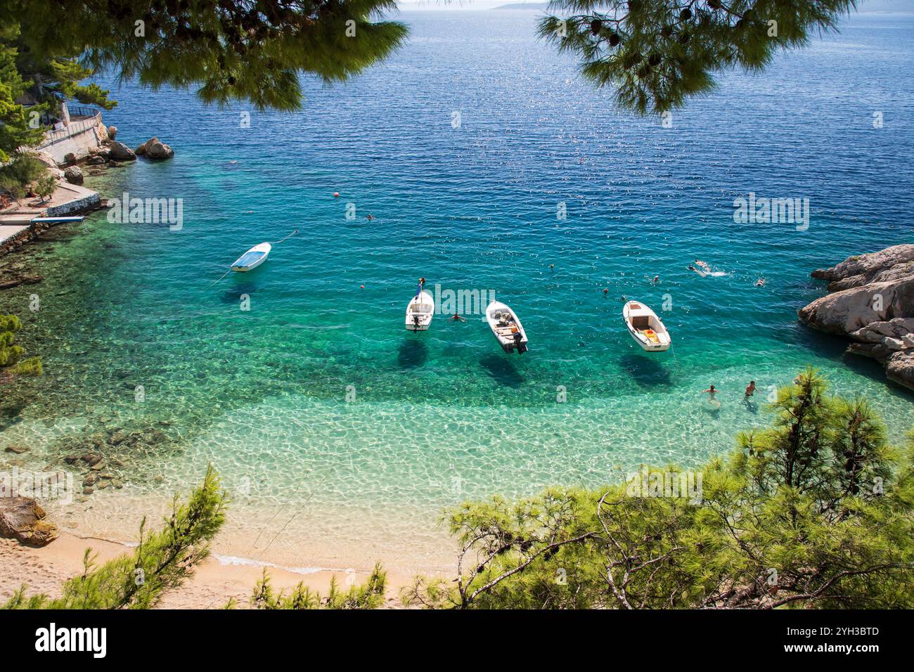 Brela, Croatia - 23rd September 2024; People enjoy sunshine on a beautiful beach in Brela on ...