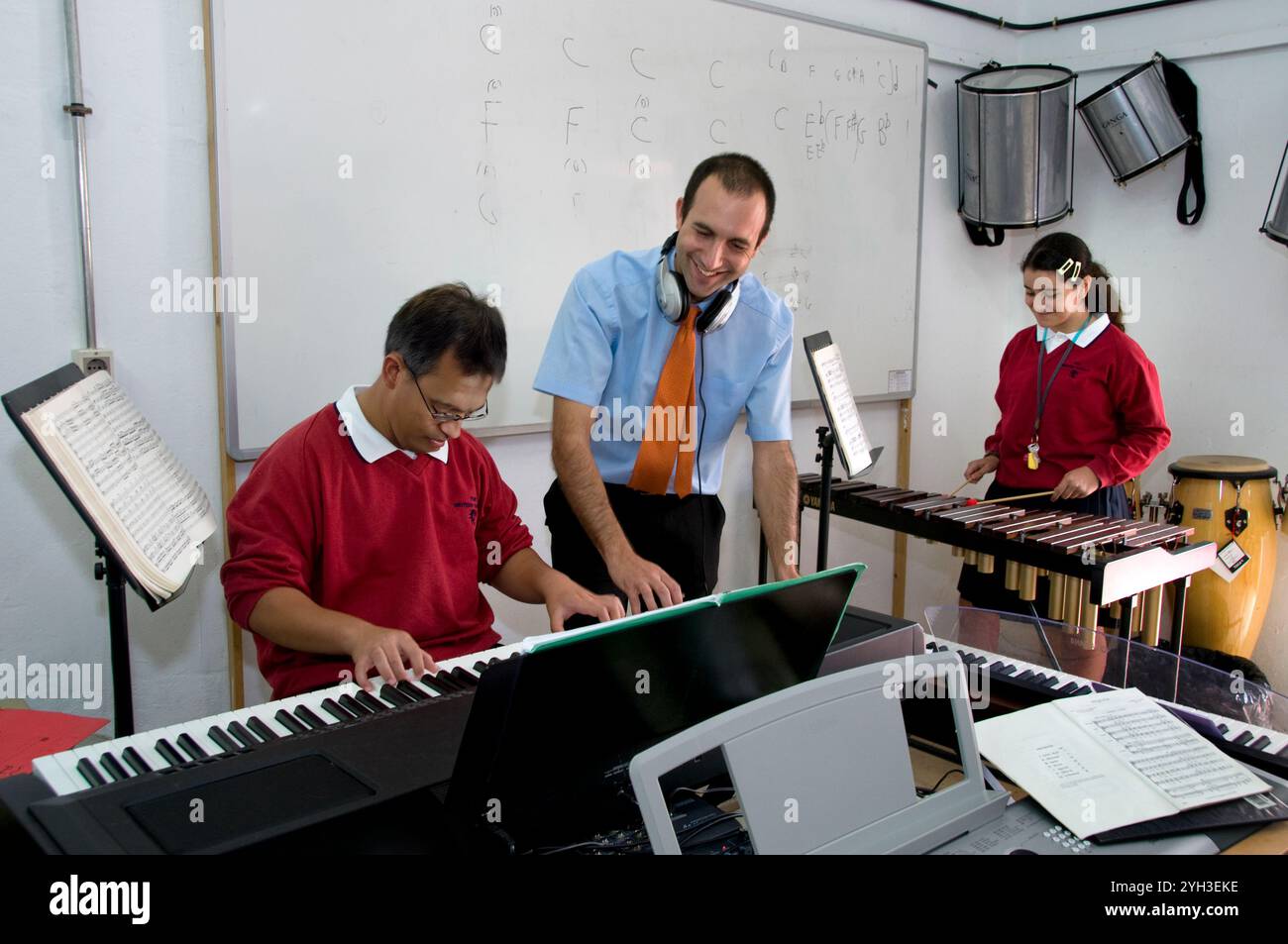 MUSIC CLASS SCHOOL ROOM Two teenage 15-17 years senior girl boy ...