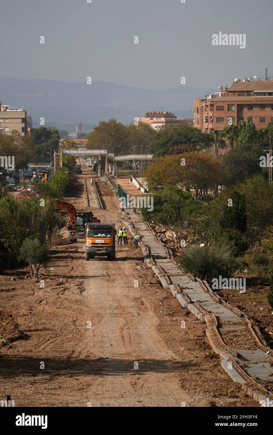 Fixing the train tracks as they pass through Aldaia, on November 9 ...