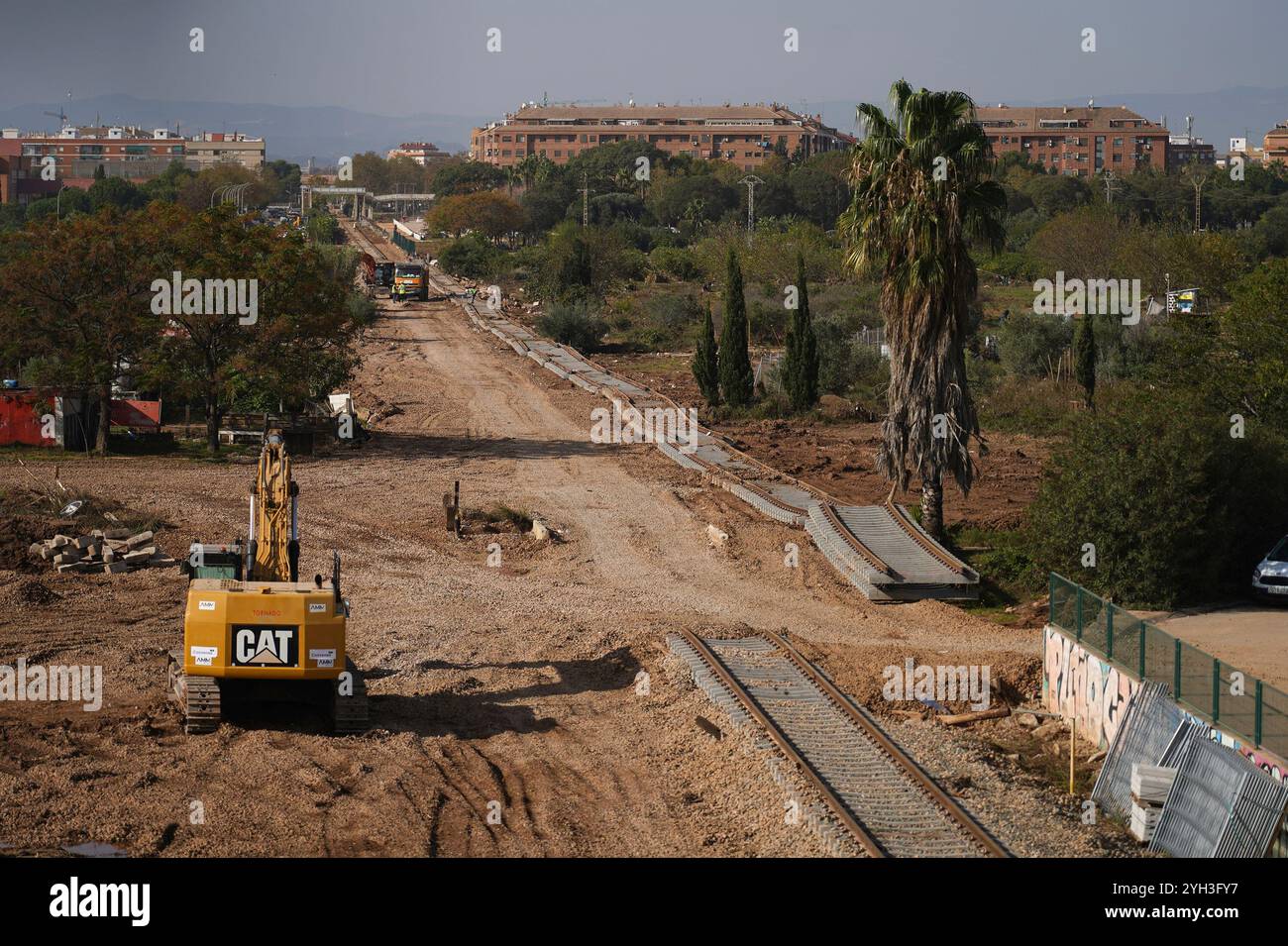 Fixing the train tracks as they pass through Aldaia, on November 9 ...