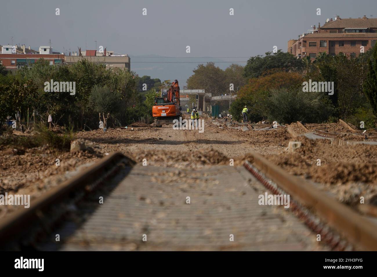 Fixing the train tracks as they pass through Aldaia, on November 9 ...