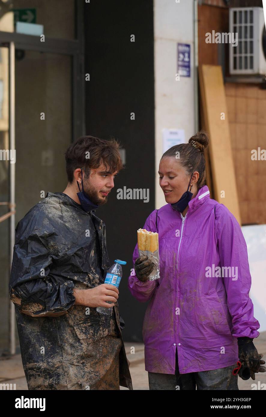 Two people eat during their break in Aldaia, on November 9, 2024, in ...