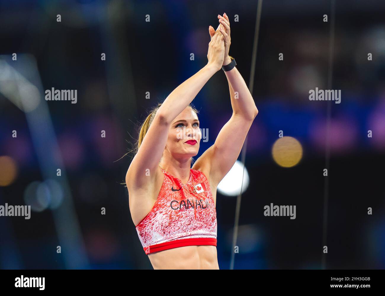 Alysha Newman participating in the pole vault at the Paris 2024 Olympic ...