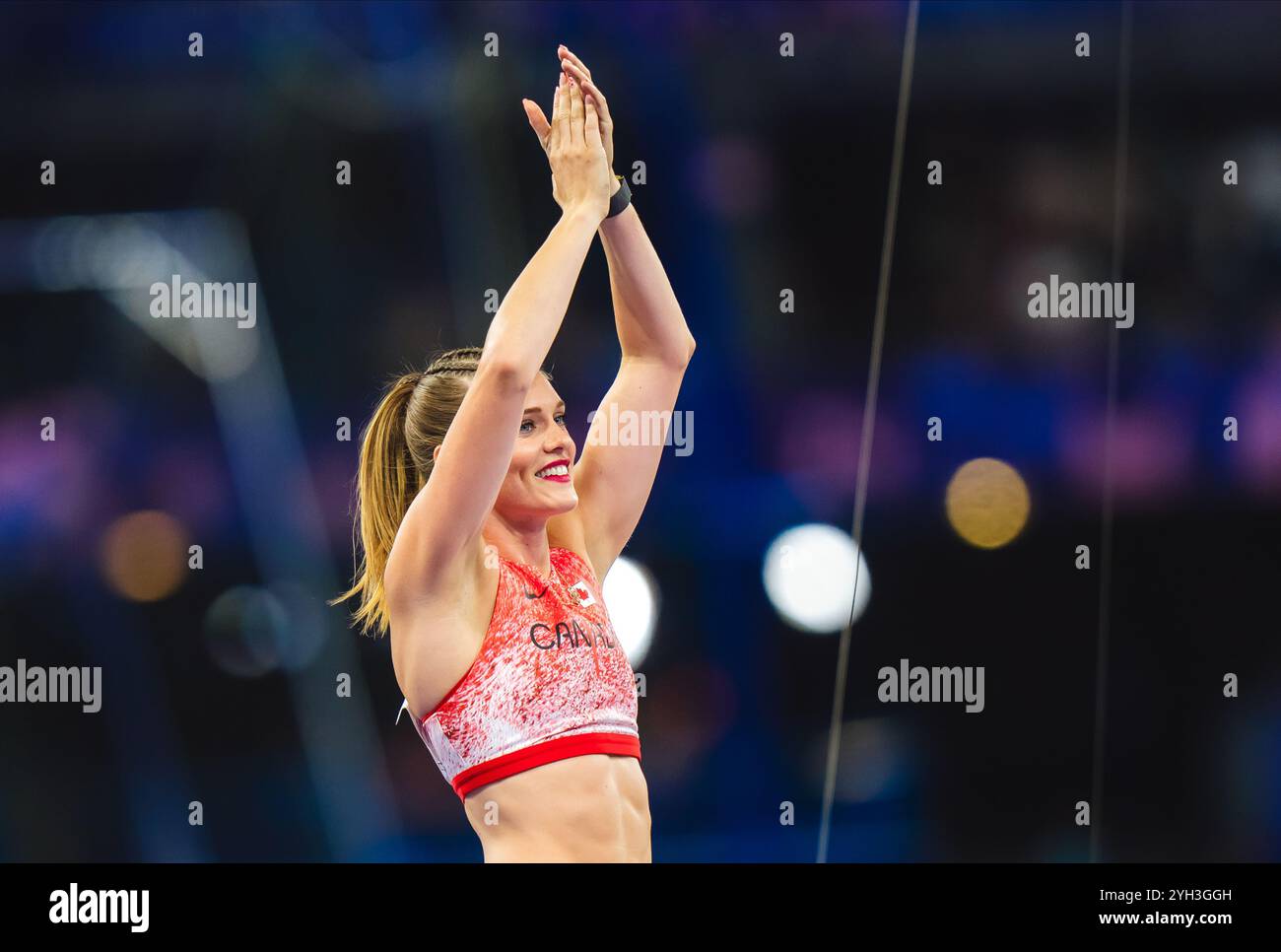 Alysha Newman participating in the pole vault at the Paris 2024 Olympic ...
