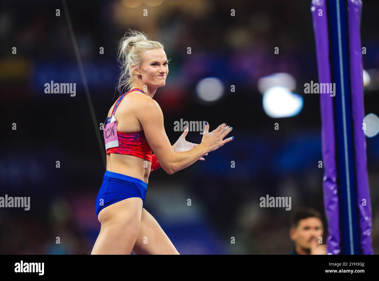 Katie Moon participating in the pole vault at the Paris 2024 Olympic ...