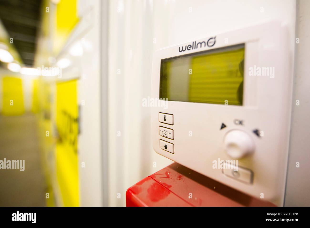 Close-up of a digital thermostat control panel in a modern storage ...
