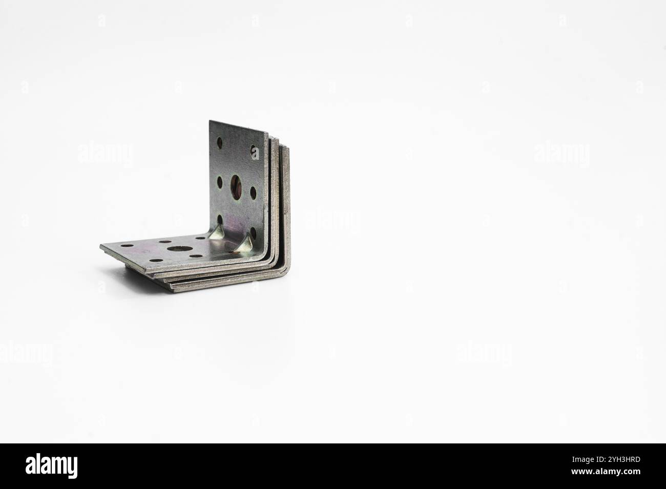 metal corners with holes. connecting elements Stock Photo - Alamy