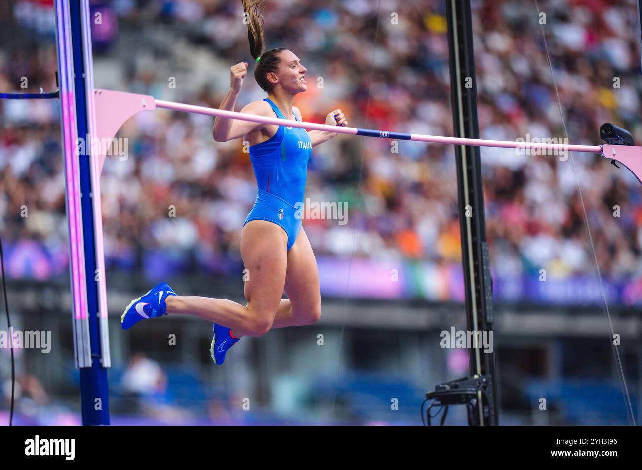 Elisa Molinarolo participating in the pole vault at the Paris 2024 ...