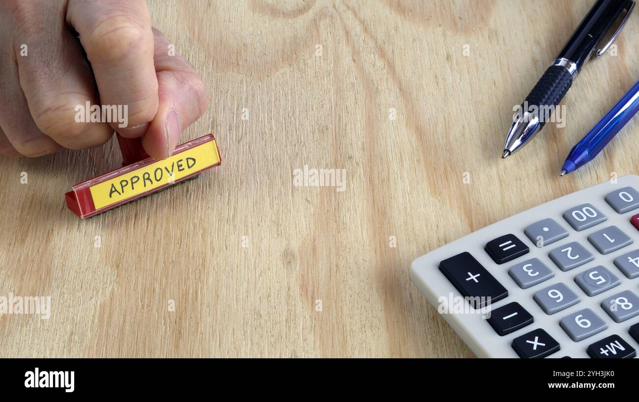 Hand pen pointing approved hi-res stock photography and images - Alamy