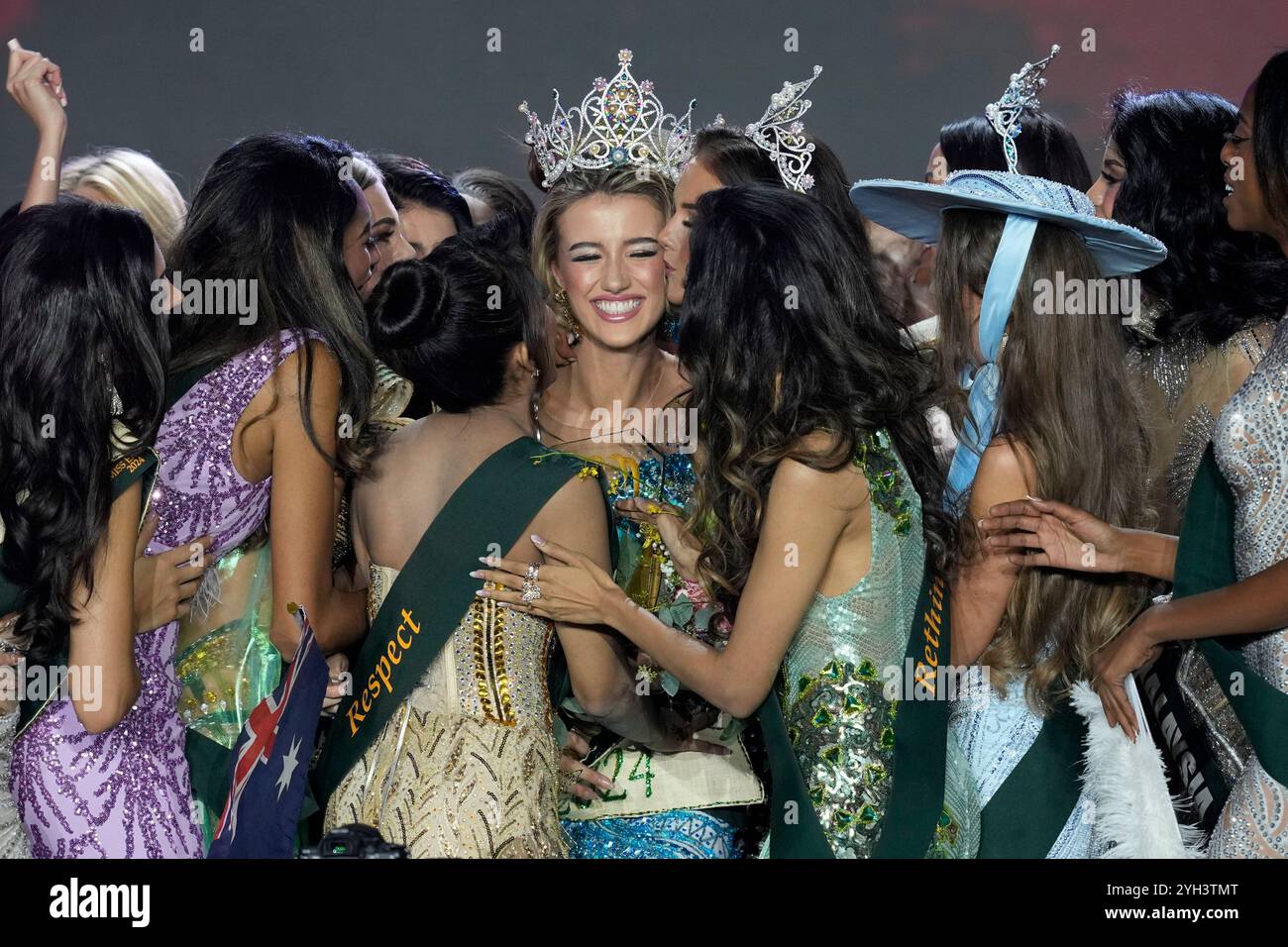 New Miss Earth 2024 Jessica Lane, center, of Australia is greeted by ...