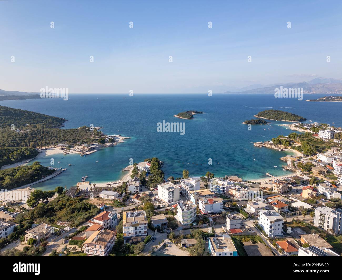 Aerial drone photo of the coastal town of Ksamil. Ksamil is a holiday ...