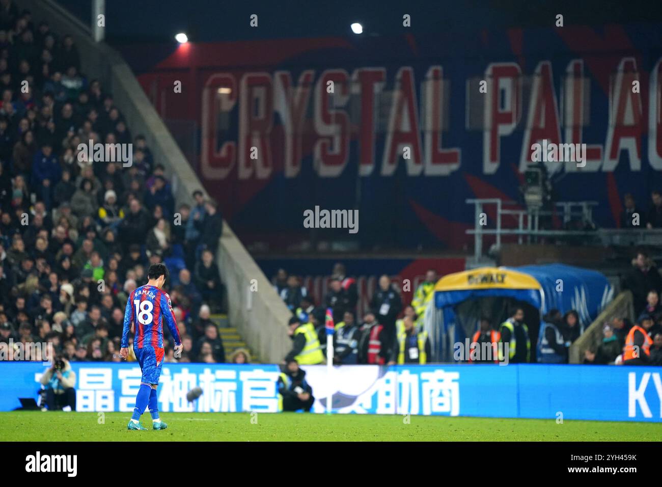 Crystal Palace's Daichi Kamada walks off the field after being shown a ...