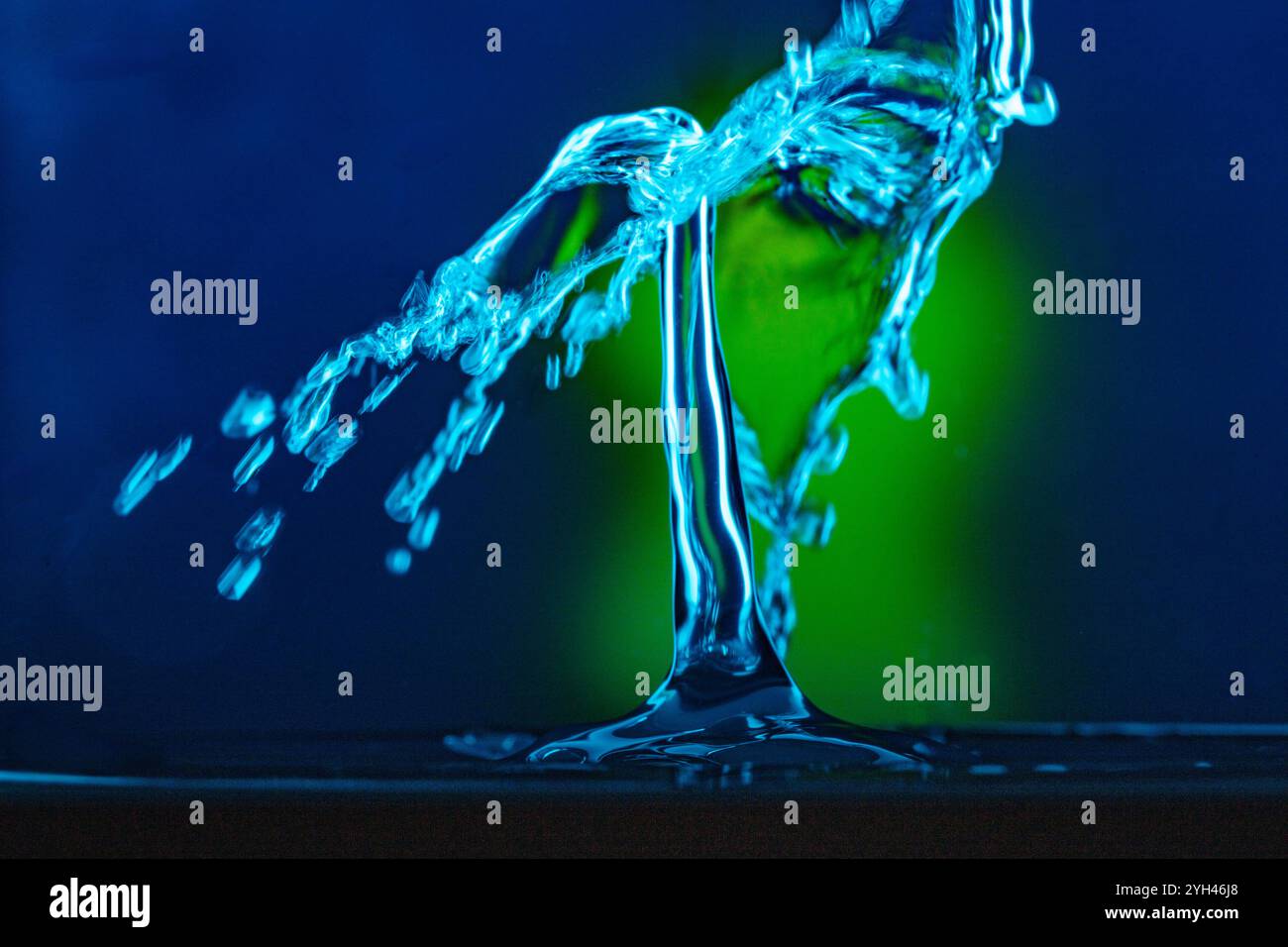 Arresting ethereal colour infused imaginative water collision macro ...