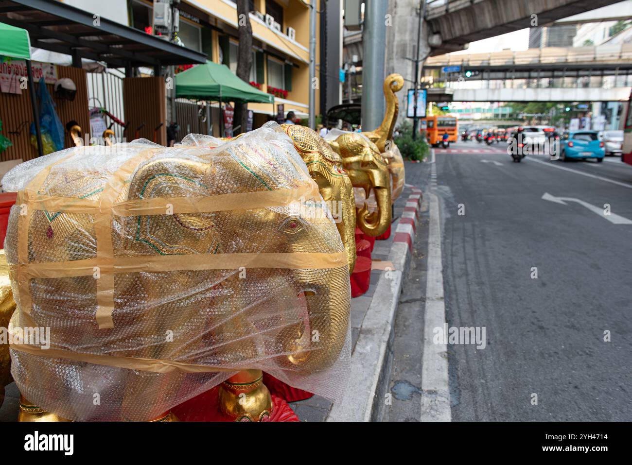 BANGKOK, THAILAND November 9, 2024 - Elephant statue. People bring ...