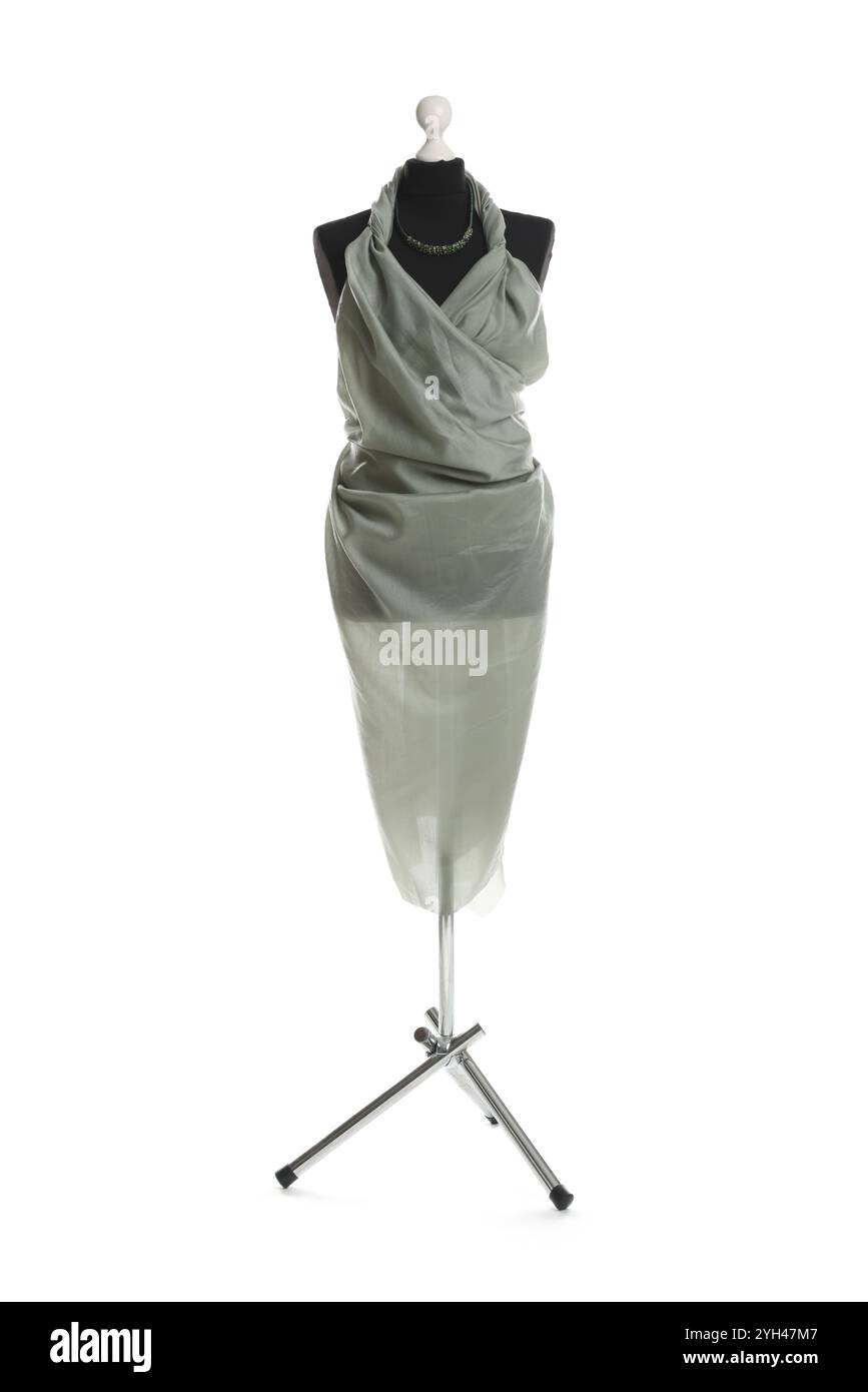 Draping grey fabric on female mannequin against white background Stock ...