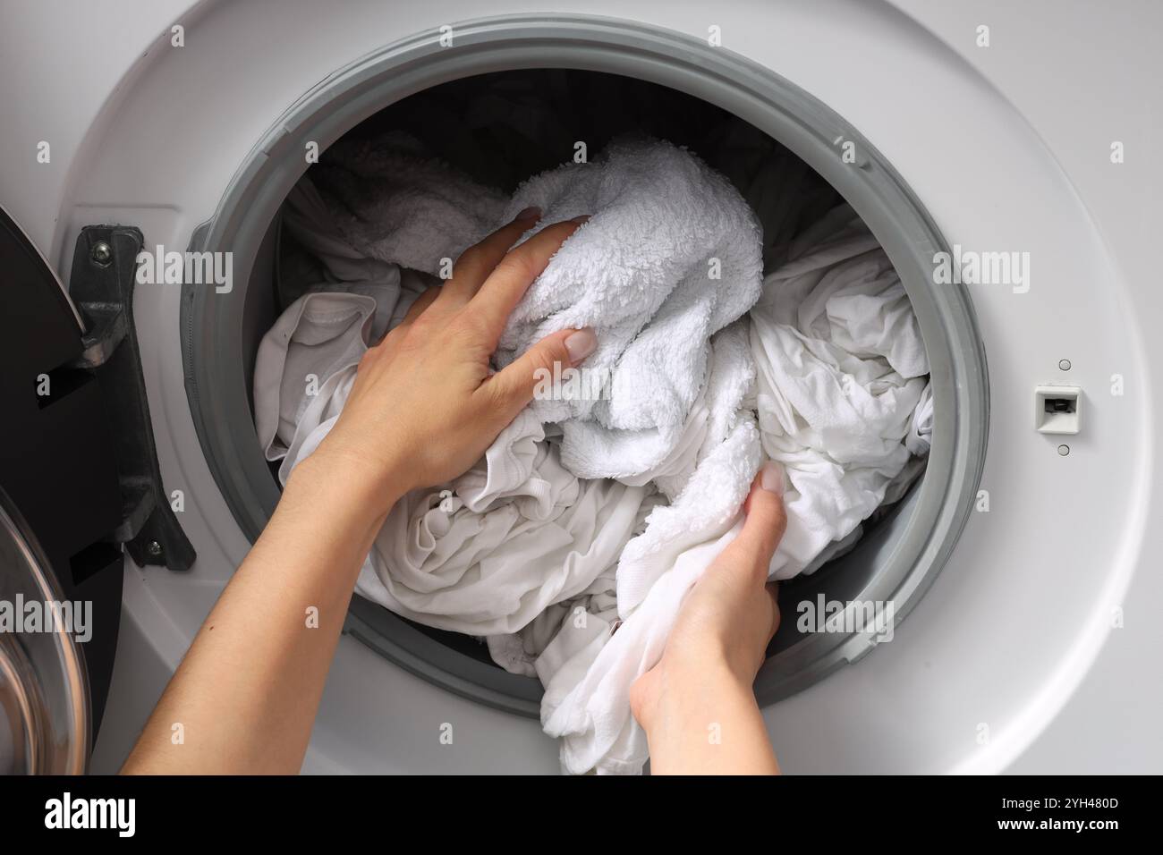 Woman putting out washing hi-res stock photography and images - Alamy