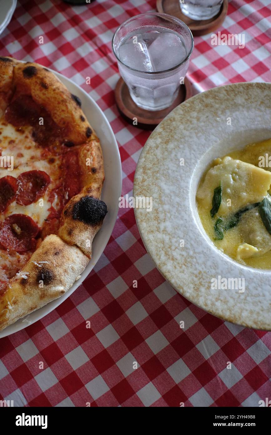 Pepperoni Pizza And Ravioli Dish Stock Photo - Alamy