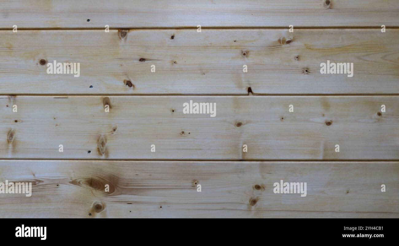 plank background of light knotty wood, wide planed boards as a texture ...
