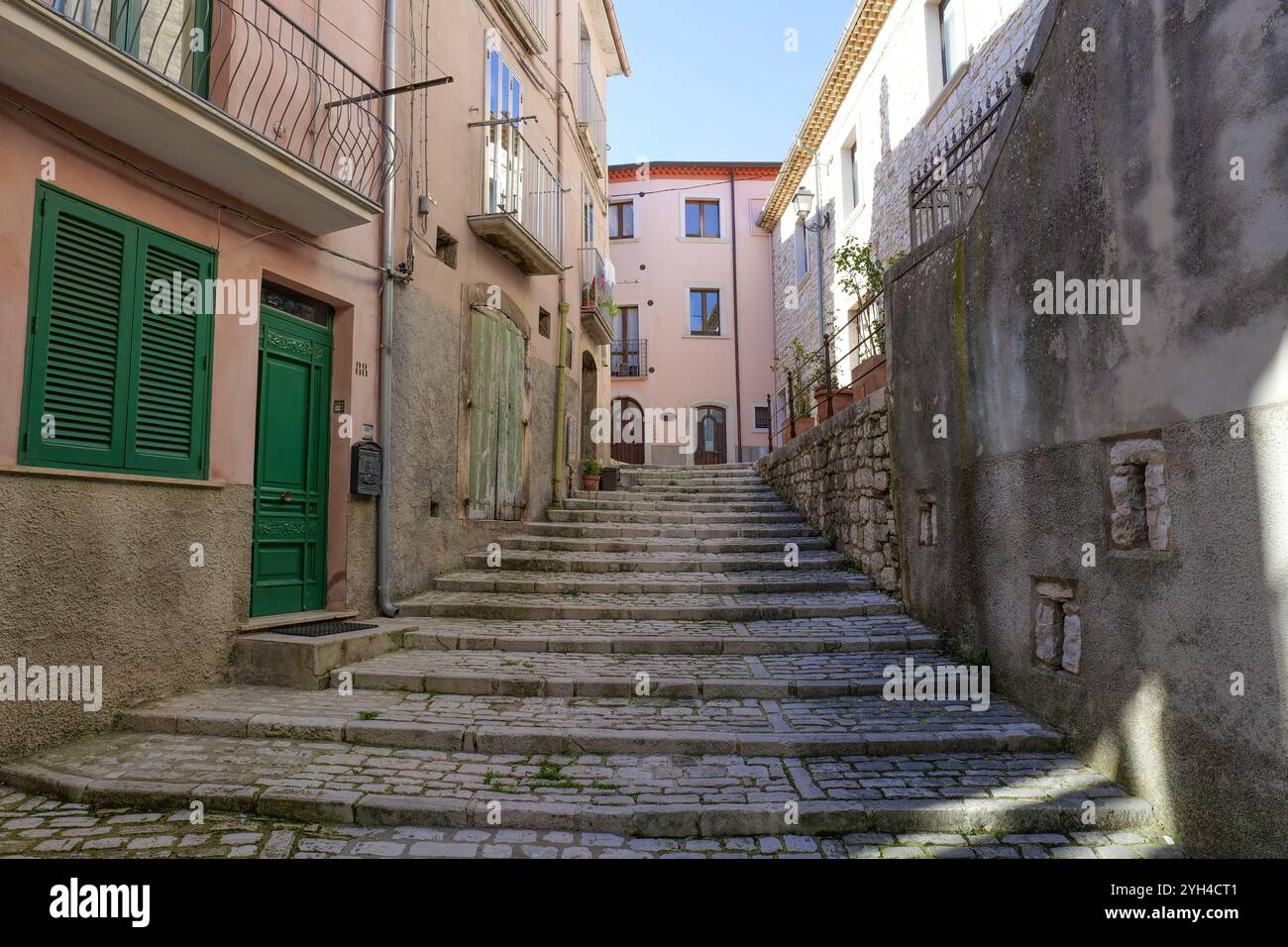 A road between the old houses of Sepino, a village in Molise, Italy ...