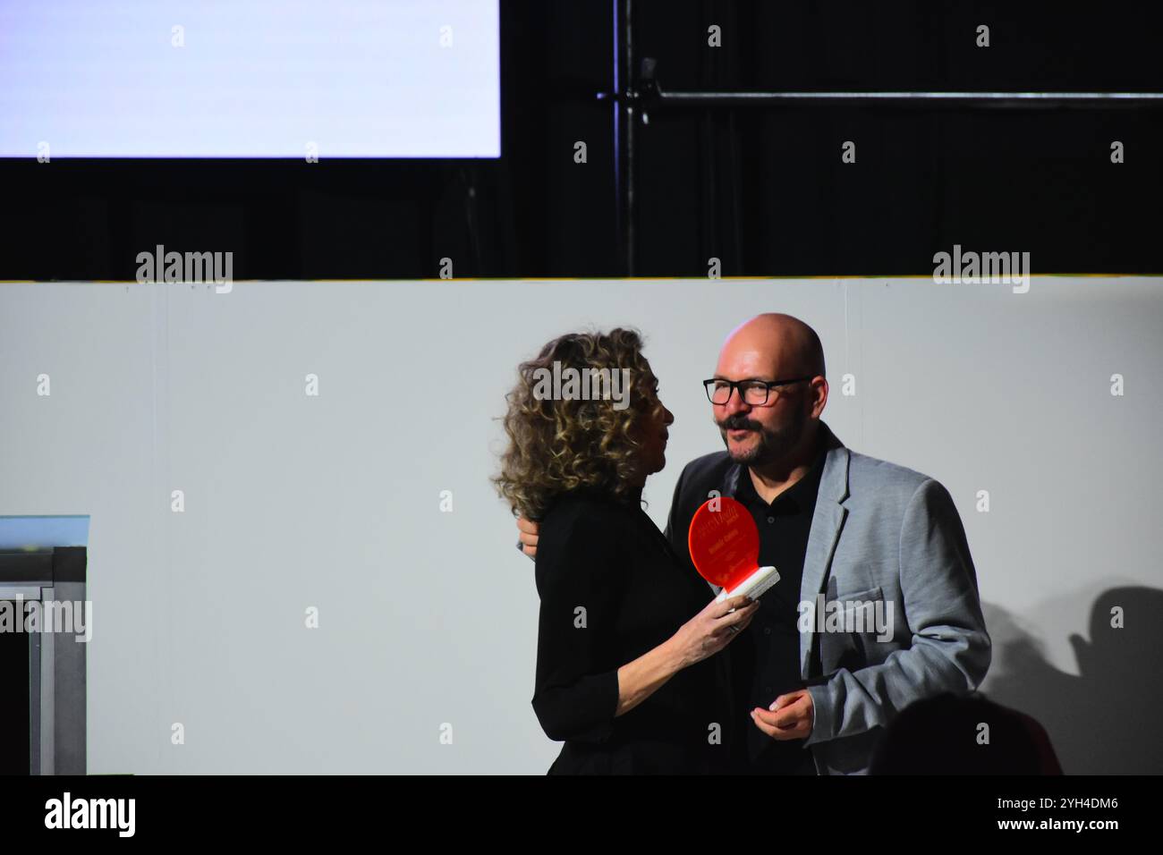 LEON, MEXICO - NOV 8. Hermes Villafuerte gives a recognition award to ...