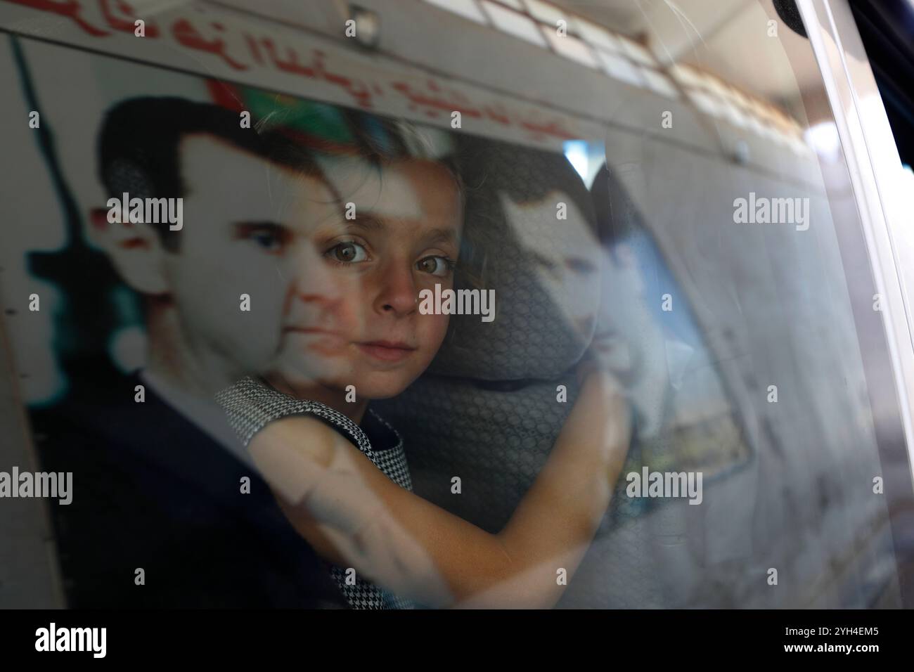 FILE - A Syrian girl fleeing the war in Lebanon with family, arrives at ...