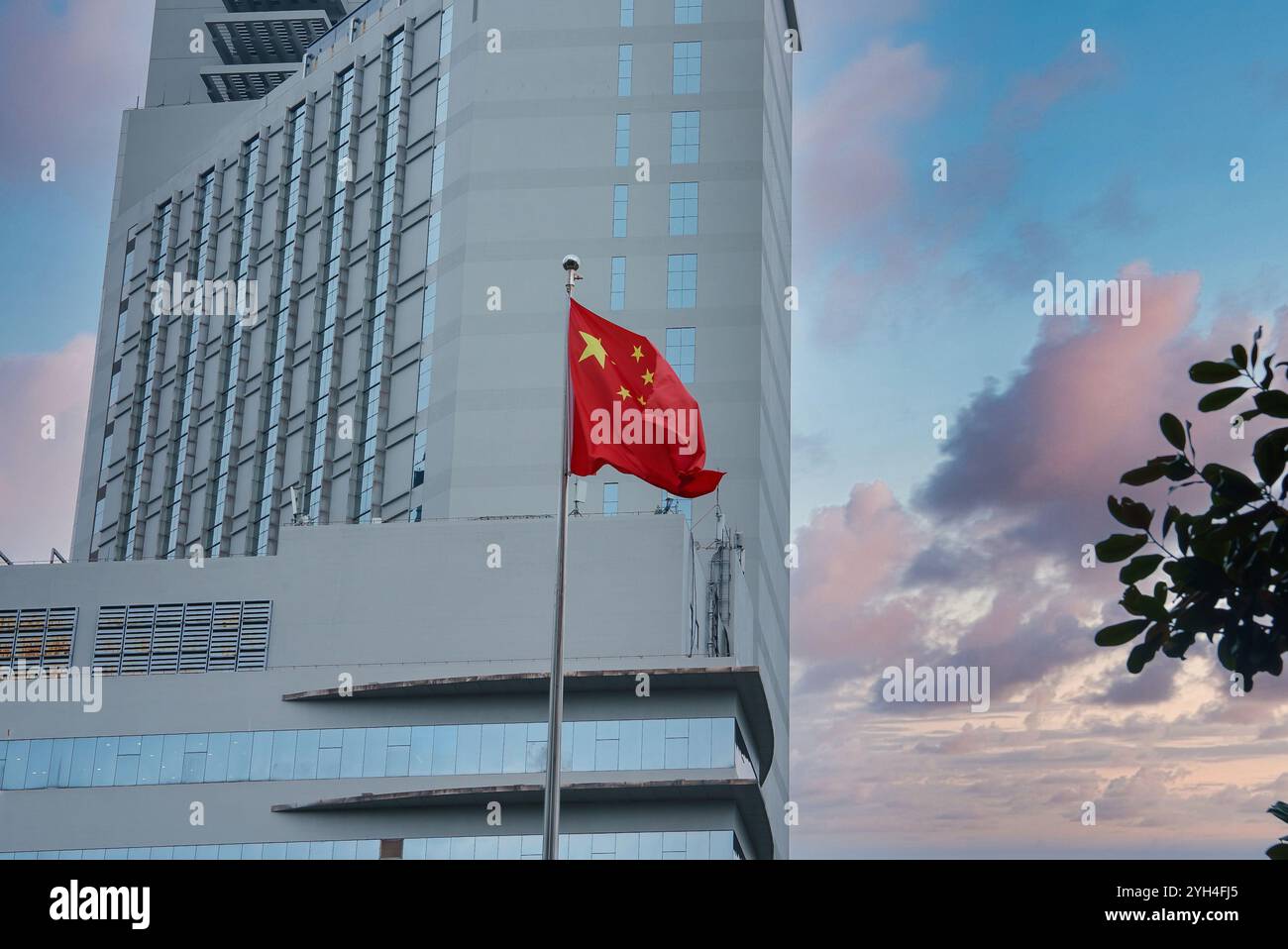 Modern Skyscraper with Chinese Flag in Shanghai at Dusk Stock Photo - Alamy