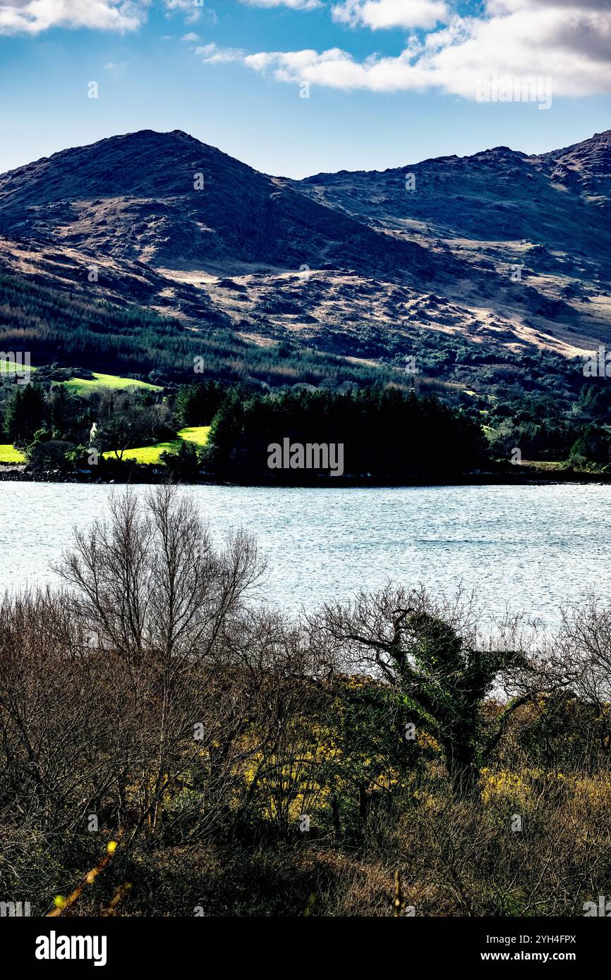 Tranquil lake reflects distant hi-res stock photography and images - Alamy