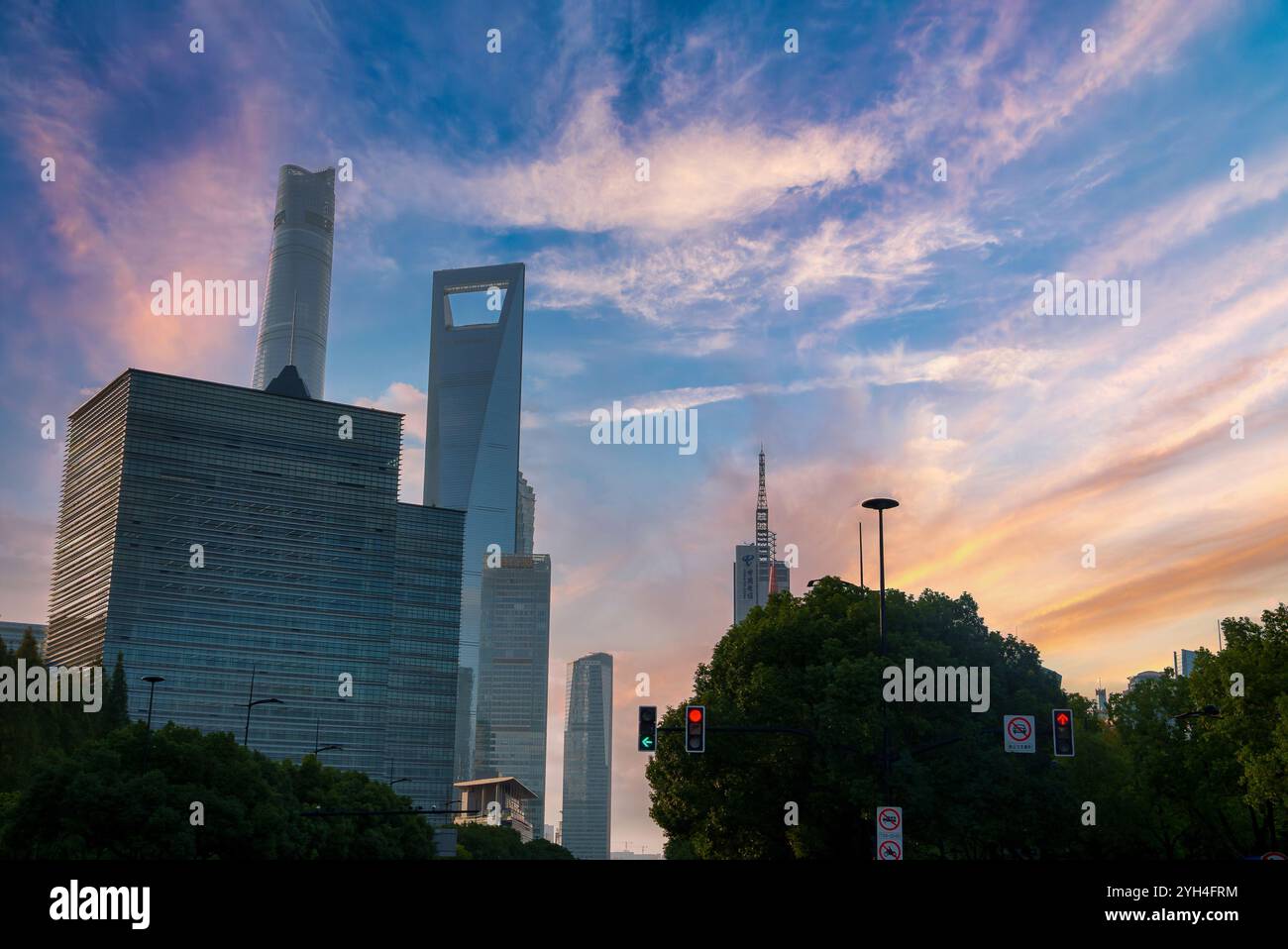 Shanghai Skyline at Sunset with Skyscrapers and Lush Greenery Stock ...