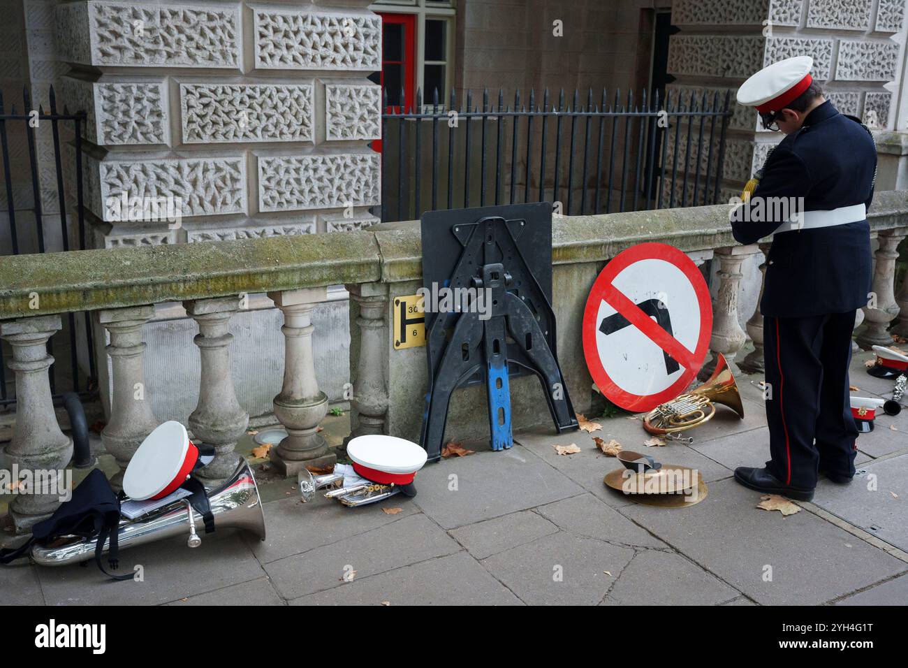 A young bandsman rests after the parade through City of London streets ...