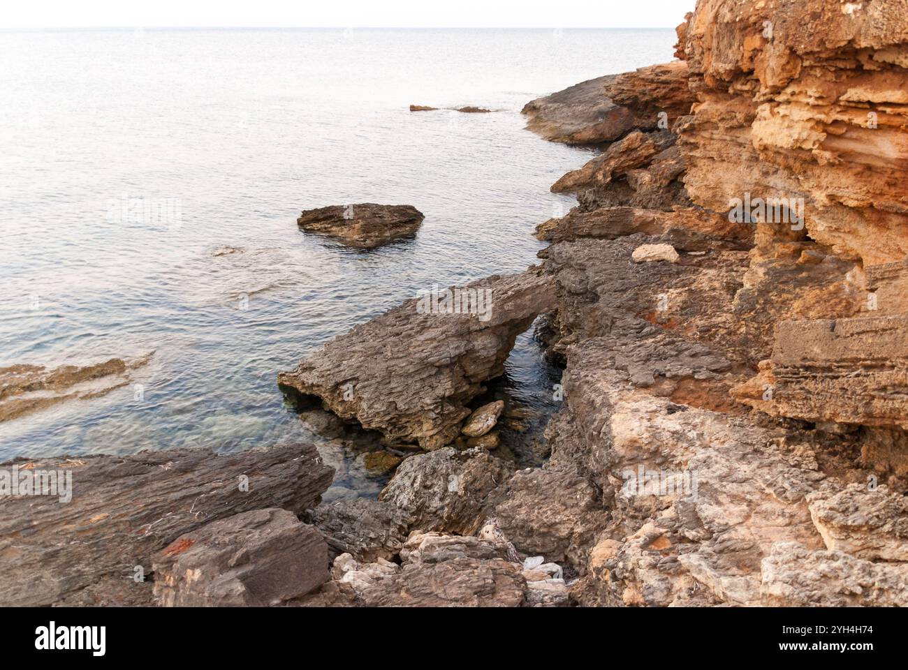Sharp rock formations on a Mediterranean coast Stock Photo - Alamy