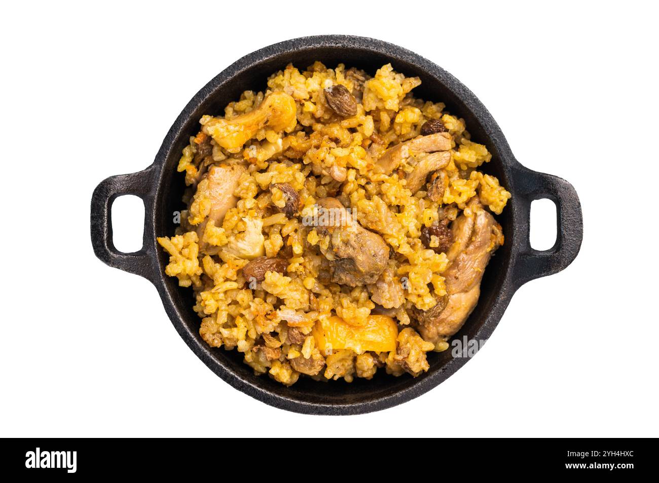 Pilaf with beef and lamb meat, vegetables in a skillet isolated on ...