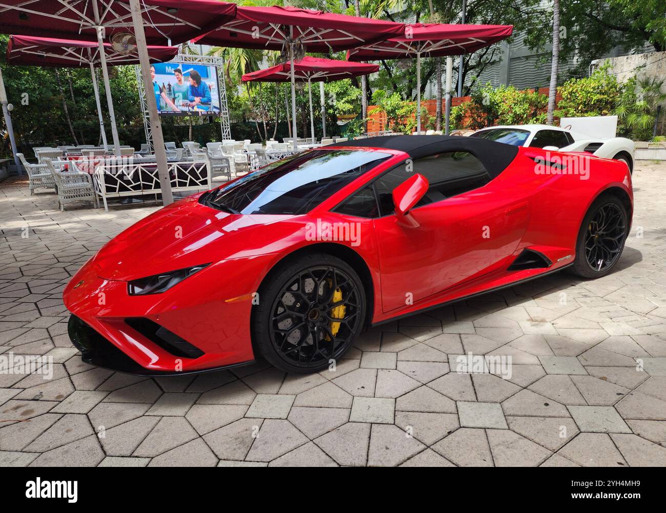 Miami Beach, Florida USA - June 8, 2024: Lamborghini Huracan red at Miami beach. Lamborghini is ...