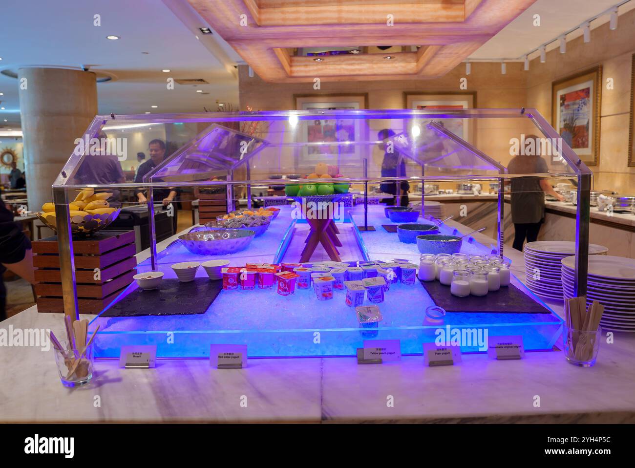 Modern Buffet Setup with Blue Lighting in Shanghai Restaurant Stock ...