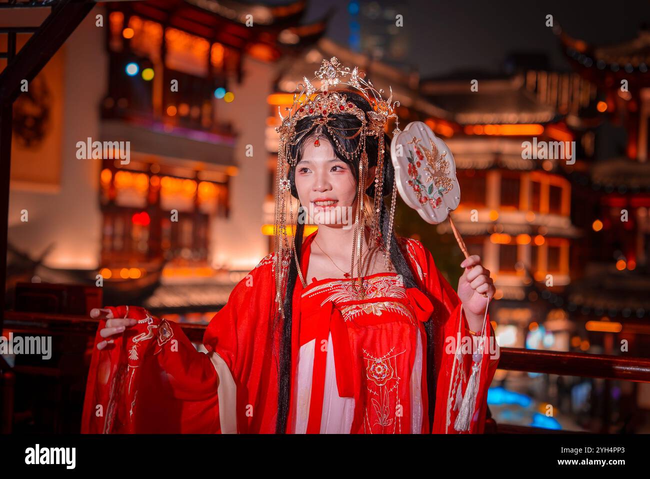 Character in traditional attire stands hi-res stock photography and ...