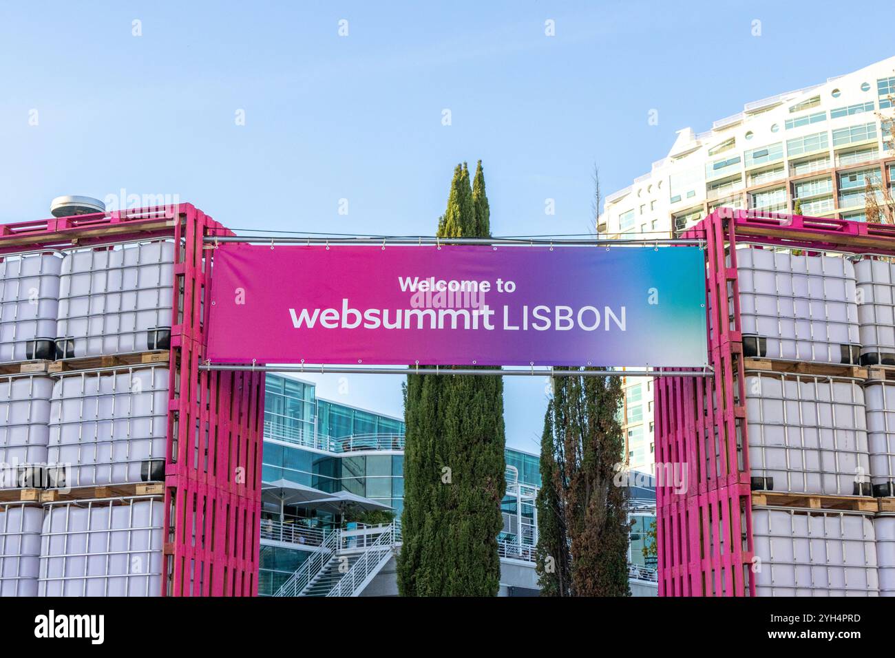 Entrance to web summit lisbon, portugal, decorated with stacks of ibc ...
