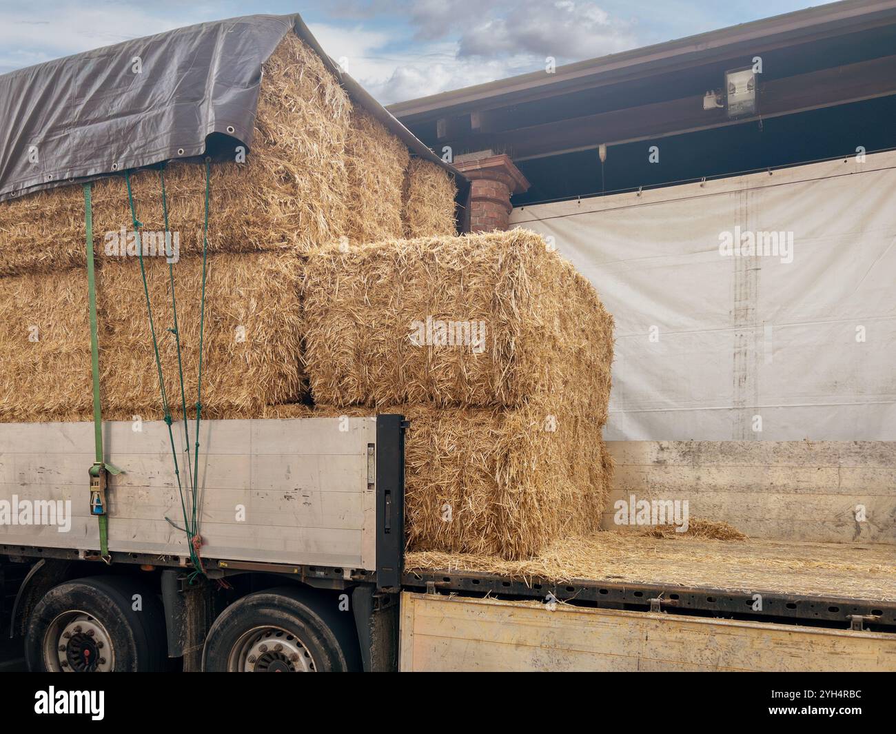 Large bales of straw on a truck Stock Photo - Alamy