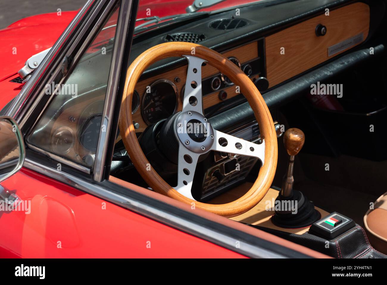 Mitzpe Ramon, Israel- May 10,2024: Fiat 124 Sport Spider wooden ...