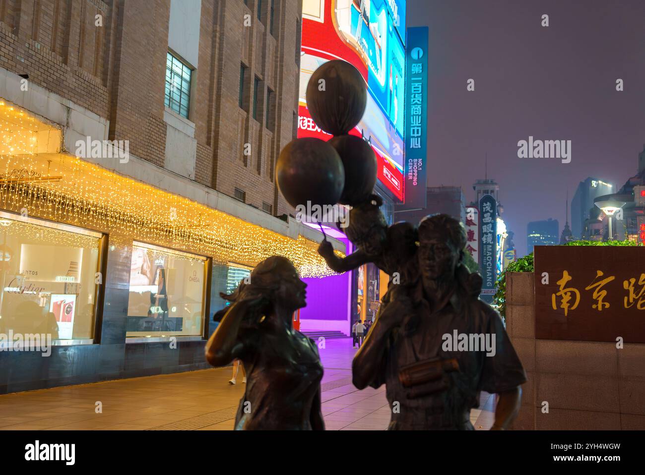 Vibrant Street Scene on Nanjing Road, Shanghai with Bronze Statue Stock ...