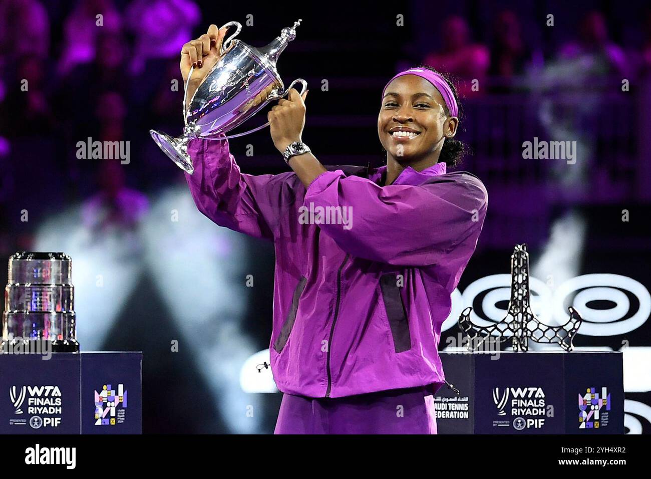 Coco Gauff of the U.S. holds her trophy after winning against China's ...