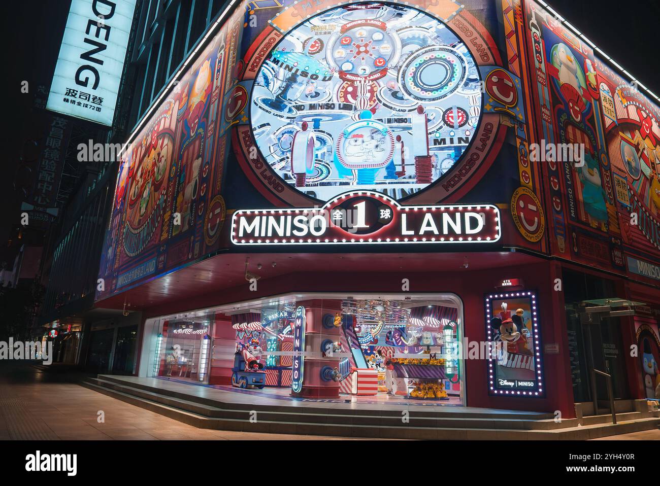 Vibrant Miniso Land Storefront with Neon Lights in Shanghai Stock Photo - Alamy