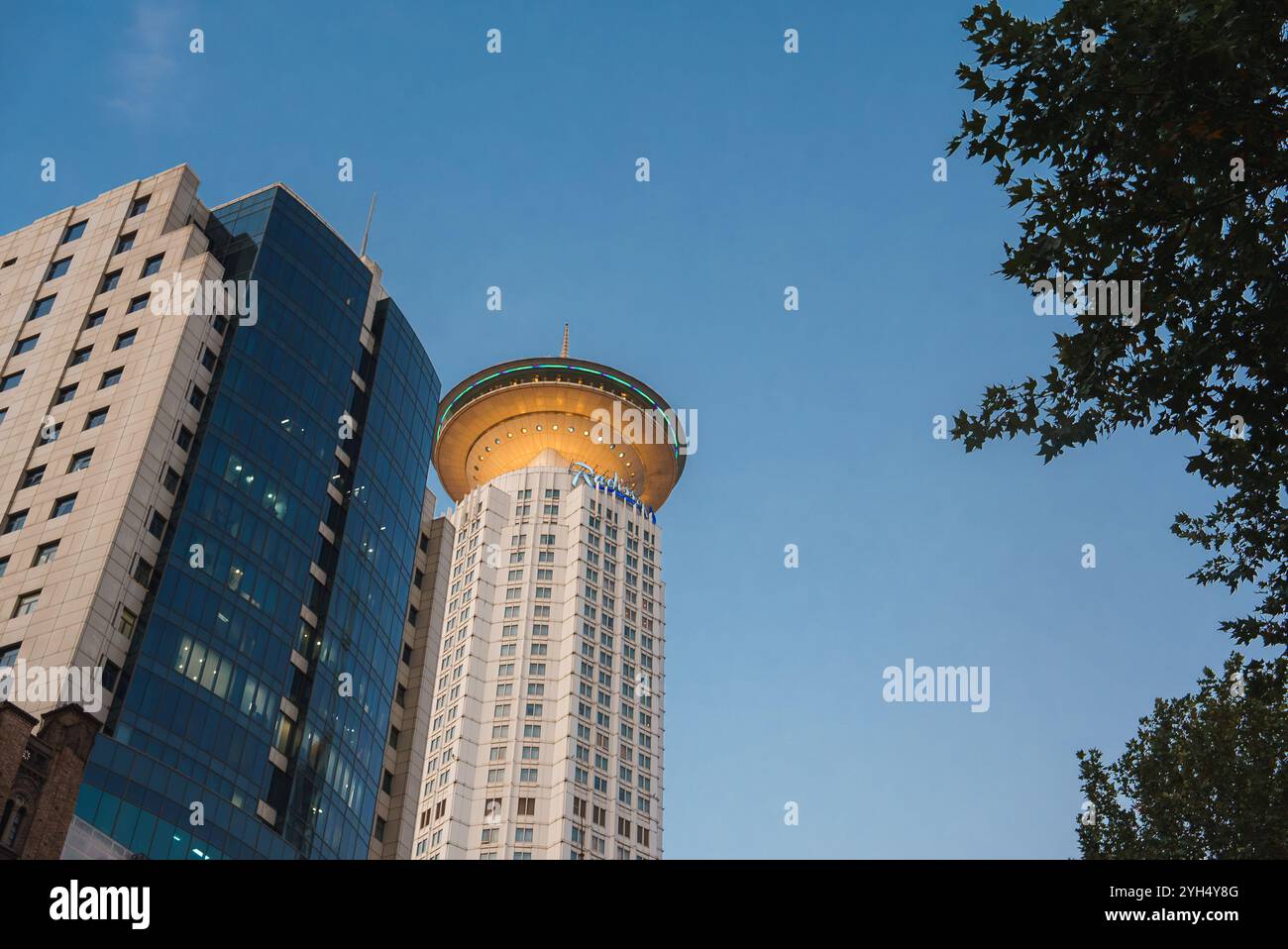 Radisson Blu Hotel Shanghai New World with UFO Shaped Restaurant Stock ...